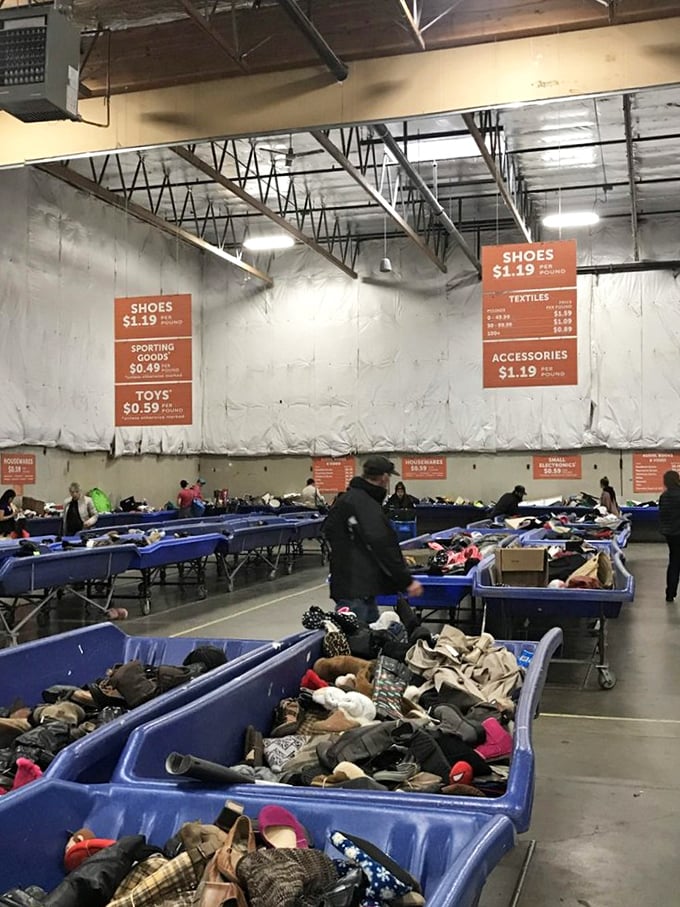 The pricing system laid bare on industrial signs. In what other shopping experience do shoes and sporting goods have their own economic tier?