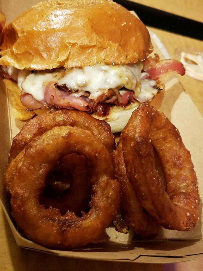 Bacon and cheese, a love story told in perfect proportion, with onion rings that could double as golden halos.