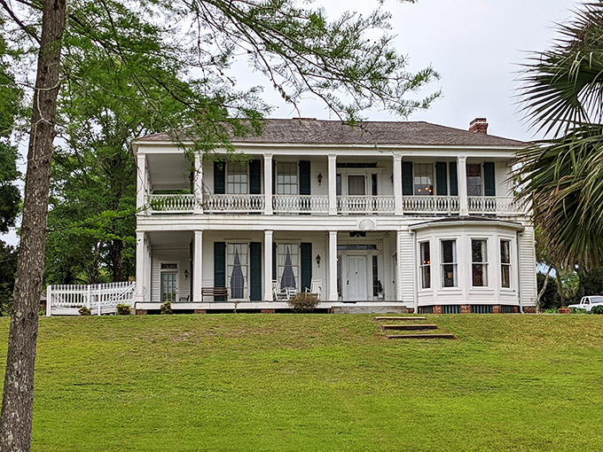 The Orman House's stately columns and wrap-around porches whisper tales of 19th-century cotton merchants and afternoon mint juleps.