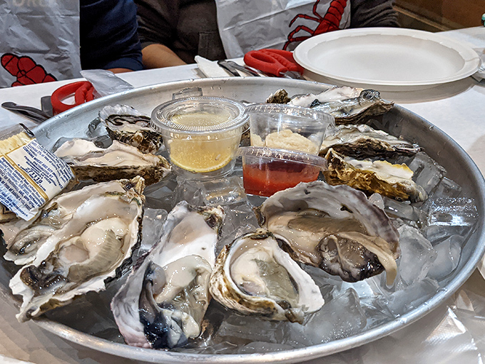Fresh oysters on ice with dipping sauces&mdash;nature's perfect appetizer, straight from the sea to the Midwest.