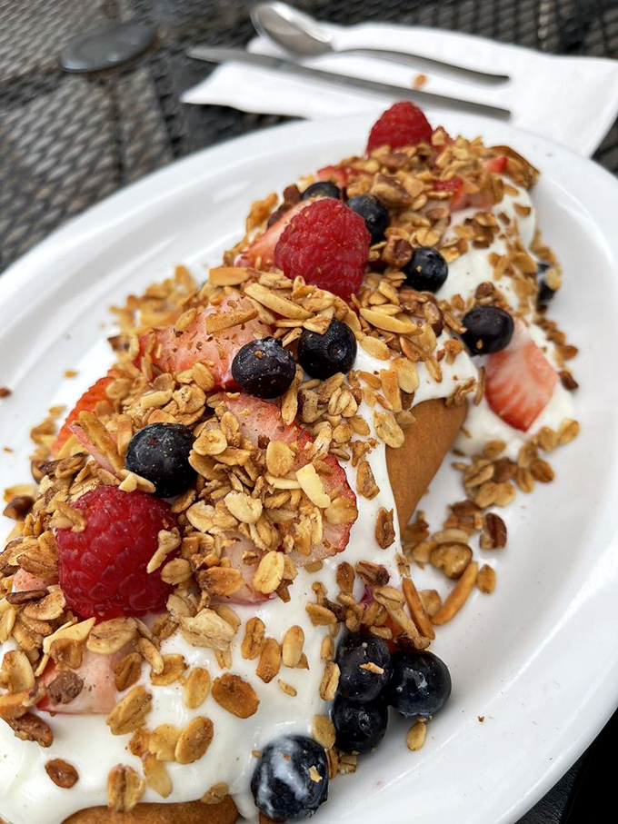 This pancake creation looks like breakfast decided to throw itself a party and invited everyone. 