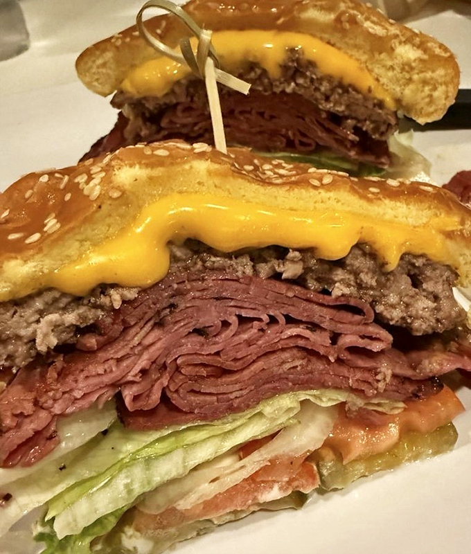 This isn't just a burger with pastrami&mdash;it's a diplomatic summit between two iconic sandwiches that decided to join forces for the greater good.