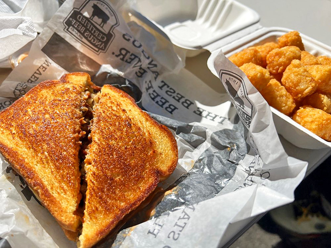 The grilled cheese and tots combo&mdash;comfort food that whispers, "Everything's going to be okay," even when your 401k suggests otherwise.