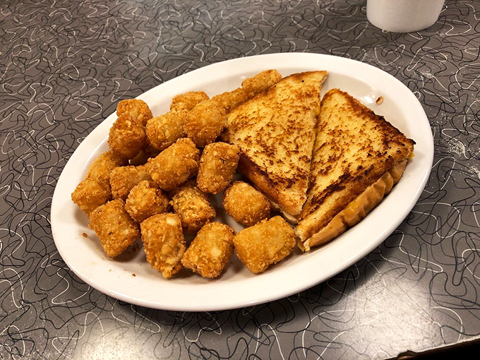 Breakfast perfection that would make Ron Swanson weep with joy. Golden hash browns and perfectly grilled toast&mdash;the breakfast of champions.