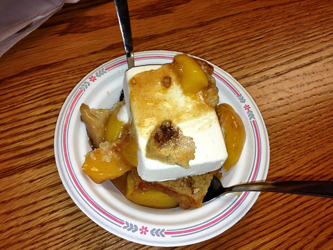 The peach cobbler arrives still bubbling from the oven, topped with ice cream melting into warm, sweet crevices. Spoon-licking guaranteed.