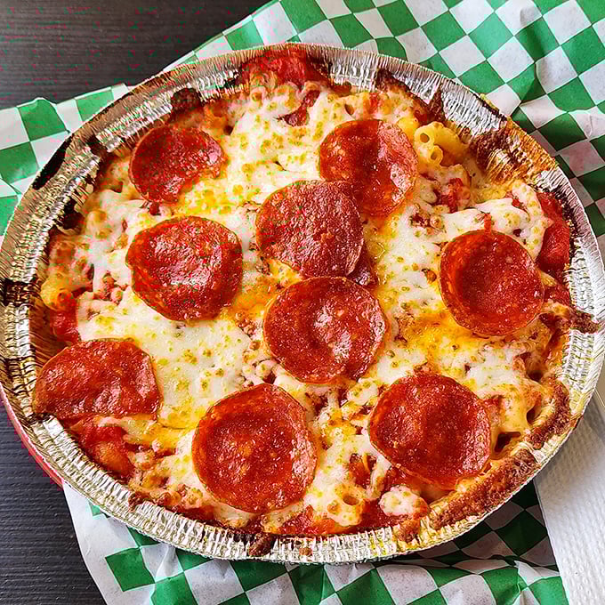 Mac and cheese pizza&mdash;the culinary equivalent of winning the lottery twice. Two comfort foods that found true love together.