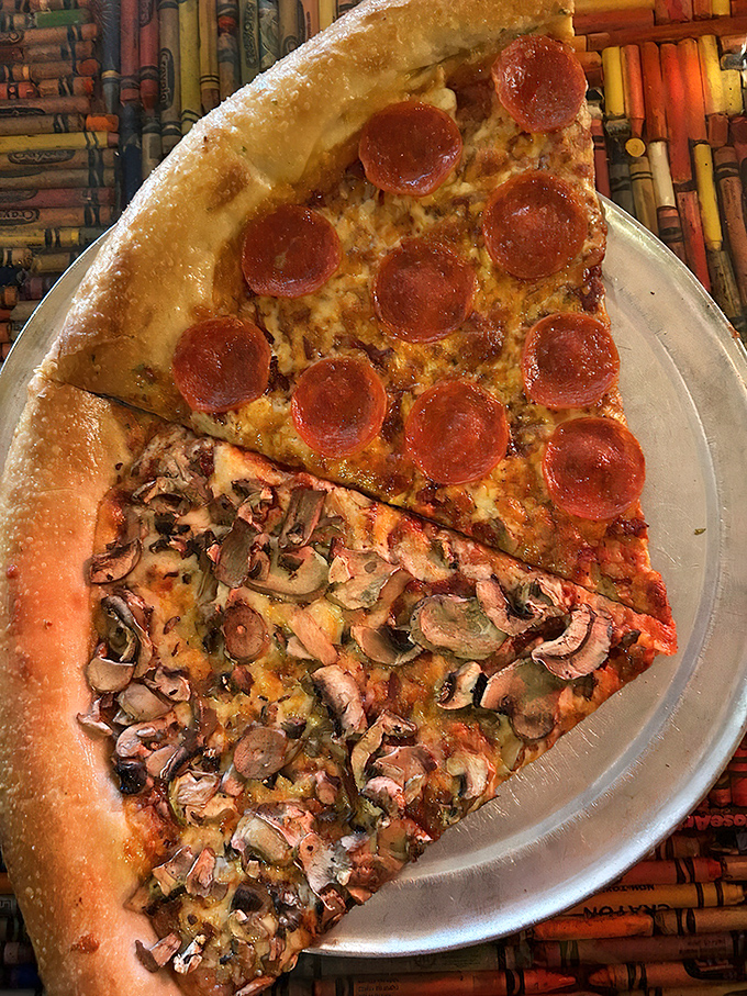 The perfect pizza slice doesn't exi&mdash; wait, is that pepperoni playing harmony with mushrooms on a stage of melted cheese?