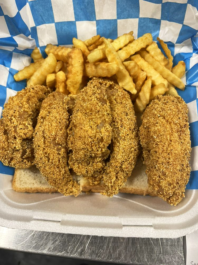 Perch fillets with that ideal crispy-to-tender ratio, proving that simple food done right beats fancy presentation every time.