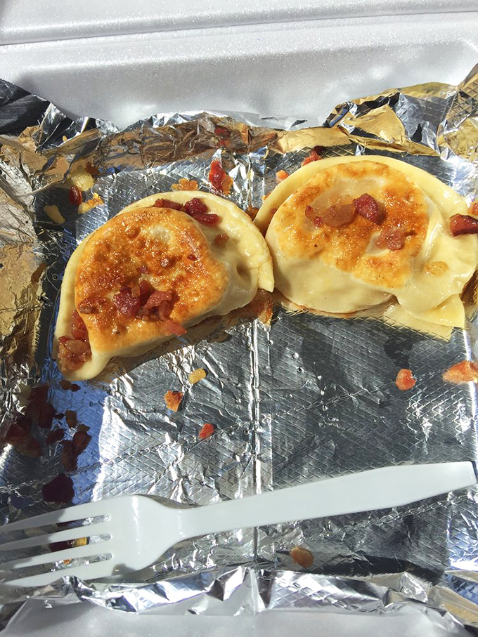 These bacon-topped pierogies aren't just food; they're an argument against every diet you've ever considered starting tomorrow.