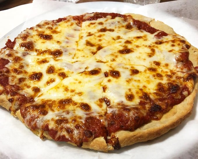 Diner pizza defies expectations with its perfectly melted cheese landscape&mdash;proof that sometimes the best Italian food comes from the most American of institutions. 