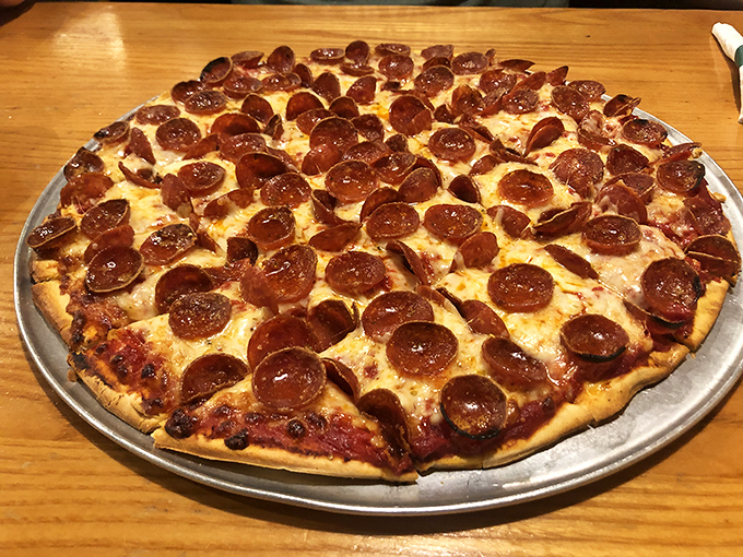 A pepperoni pizza that doesn't skimp on the good stuff. Each slice is a democratic republic where every pepperoni gets equal representation.