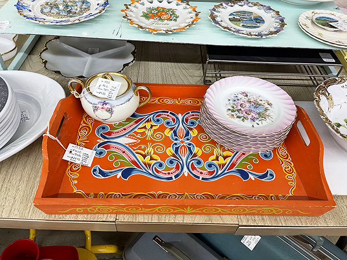 Colorful serving trays and fine china prove that presentation once mattered as much as the meal.