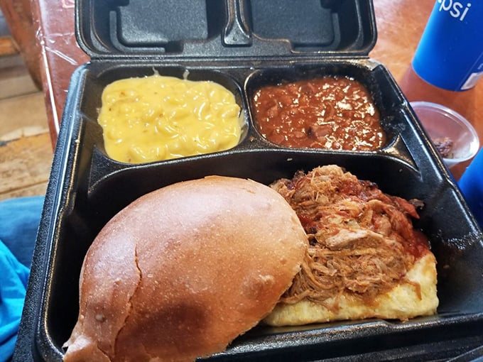 The pulled pork sandwich&mdash;where slow-smoked porcine perfection meets pillowy bun in a relationship that was clearly meant to be.