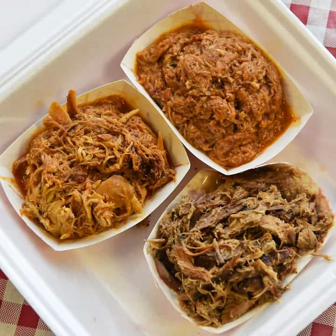 Three meats, three textures, one glorious BBQ trifecta. This pulled pork has been coaxed into tender submission over hours of gentle heat.