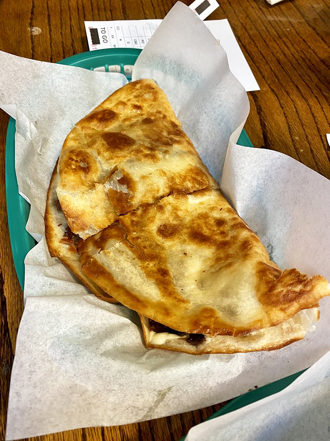 The humble quesadilla elevated to art form. Golden-brown, crispy exterior giving way to molten cheese&mdash;proof that simplicity, when done right, is revolutionary.