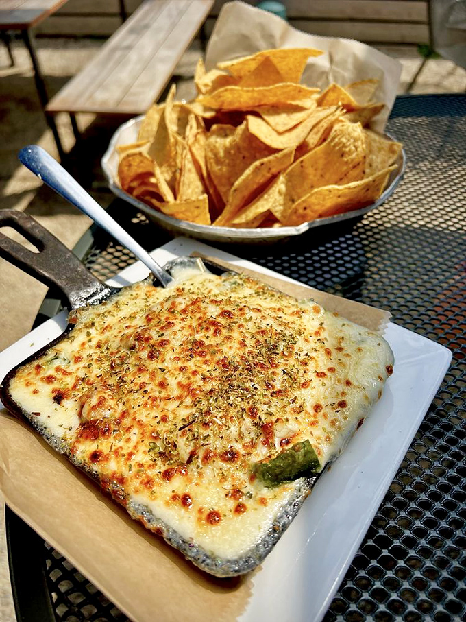 Bubbling cheese with a crispy top&mdash;the queso flameado arrives sizzling and demanding attention. Grab a tortilla and prepare for stretchy, gooey bliss.