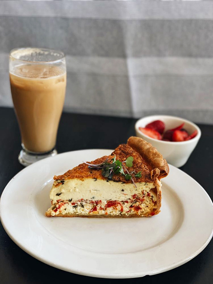 Breakfast of champions? This savory quiche with its flaky European-style crust pairs perfectly with that iced coffee, making Monday mornings almost bearable.