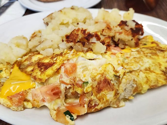 This omelet has more fillings than my last dental appointment, but tastes considerably better. The crispy hash browns are non-negotiable companions.