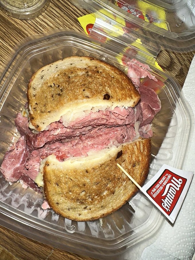 The Reuben to end all Reubens &ndash; a tower of meat, sauerkraut, and melted Swiss that requires strategic planning just to take a bite.