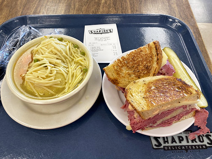 The Reuben at Shapiro's isn't just a sandwich; it's an architectural marvel of corned beef, sauerkraut, and Swiss that demands both hands and your full attention.