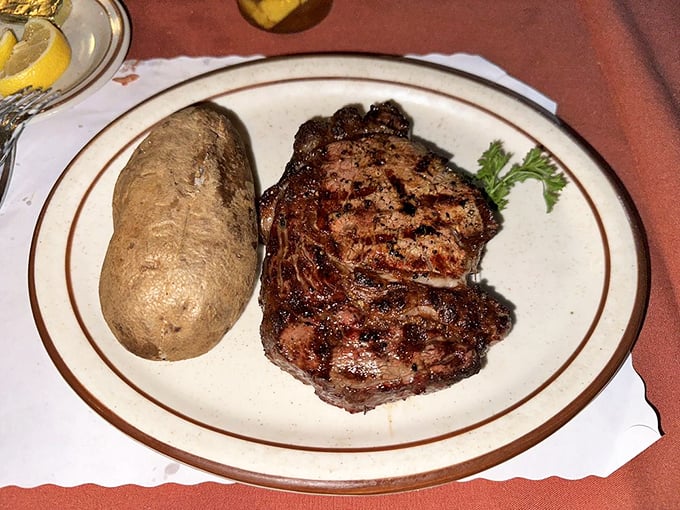This rib eye and classic baked potato combo is the comfort food equivalent of a warm hug from someone who really knows how to cook.