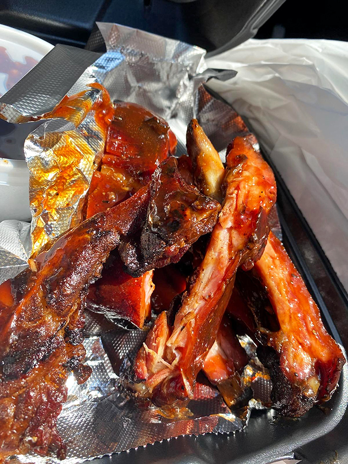 These ribs aren't just smoked&mdash;they're serenaded for hours until they surrender all their porky goodness to your eager taste buds. 