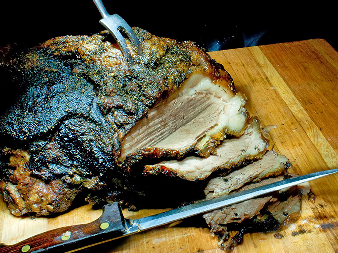 Roast pork that's been slow-cooked to the point where it practically surrenders to your fork &ndash; carnivore nirvana on a cutting board.
