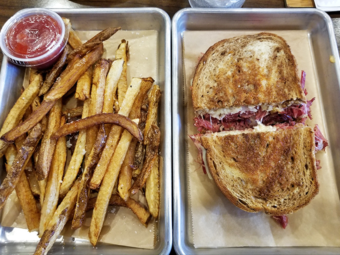 A Reuben sandwich that's achieved perfect harmony between corned beef and sauerkraut, with fries that deserve their own fan club.