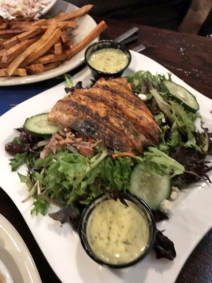 Even the salads mean business here. This grilled salmon perched atop fresh greens proves Scratch excels beyond the beef department.