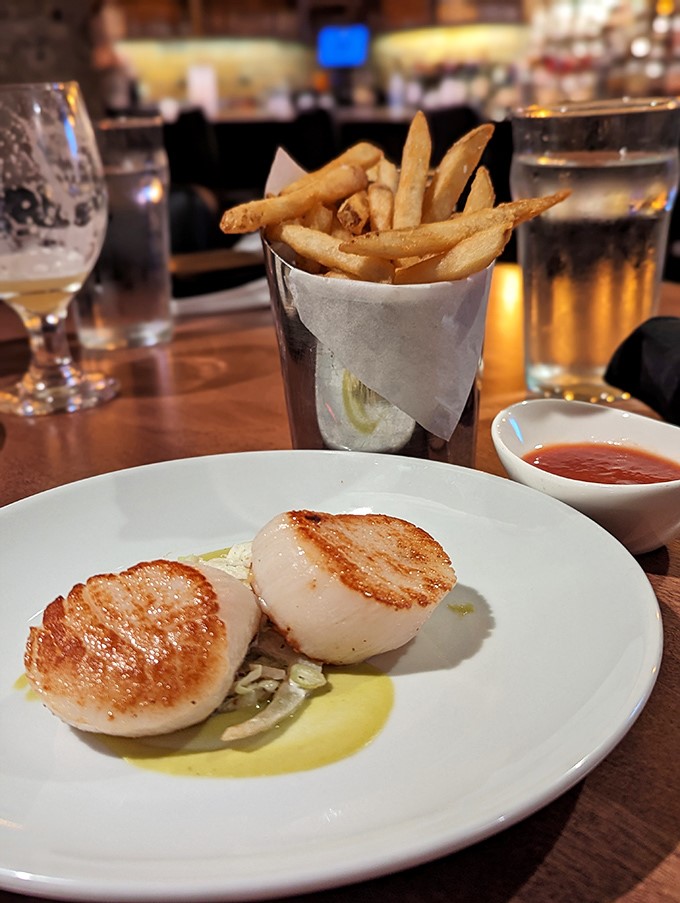 Scallops seared to that magical caramelized exterior while maintaining their buttery interior &ndash; the culinary equivalent of threading a needle while skydiving.