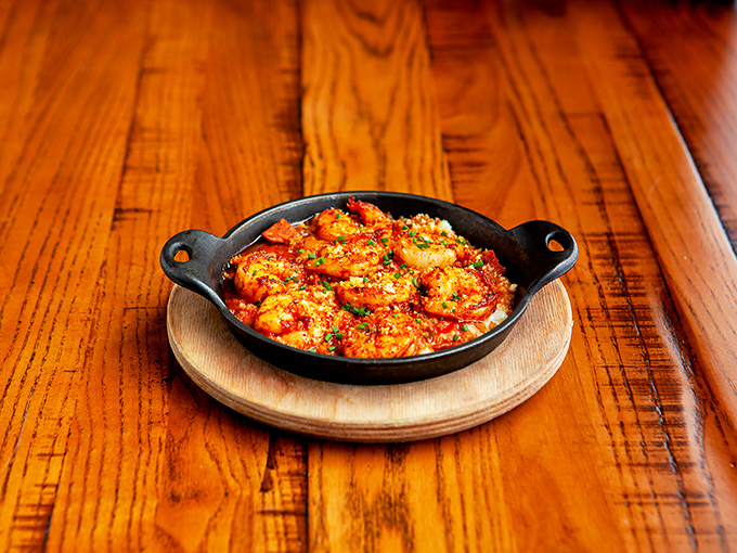 Shrimp that looks like it's having more fun than you are, swimming in a sauce that's got more personality than most dating app profiles.