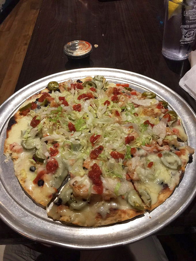 Someone clearly got their PhD in Proper Pizza Architecture&mdash;this pie balances toppings with the precision of a culinary tightrope walker.