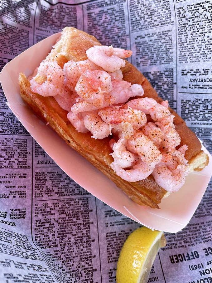 Don't let its delicate appearance fool you&mdash;this shrimp roll packs flavor that could make a New Englander weep with joy. Newspaper underneath? That's authenticity you can taste.
