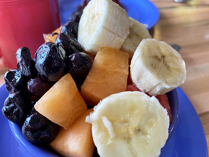 Nature's candy in a blue bowl. Fresh fruit this vibrant at elevation feels like a magic trick only The Stove can pull off.