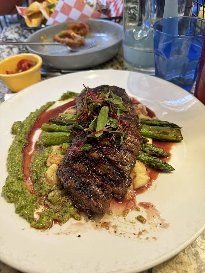 This steak isn't just cooked&mdash;it's been sweet-talked to perfection. Those asparagus spears are standing at attention for good reason.