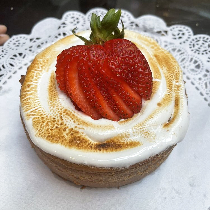 This s'mores cheesecake with its perfectly torched top and fresh strawberry isn't just dessert&mdash;it's edible art that tastes like summer camp for grown-ups.