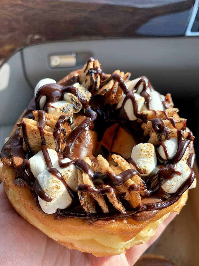 This s'mores donut isn't just dessert&mdash;it's a campfire experience without the mosquitoes, perfectly contained in handheld form.