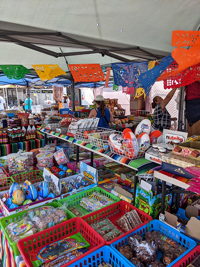 Colorful papel picado flags flutter overhead while baskets overflow with treats that would make any supermarket snack aisle hang its head in shame.
