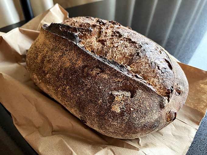 A country loaf with the kind of crust that sings when you squeeze it&mdash;the bread equivalent of a perfectly aged leather jacket.