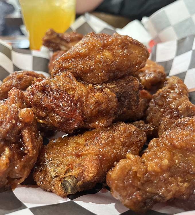 Glistening with sweet-savory glaze, the soy garlic wings achieve that perfect balance between sticky and crispy &ndash; napkins required, regrets impossible.