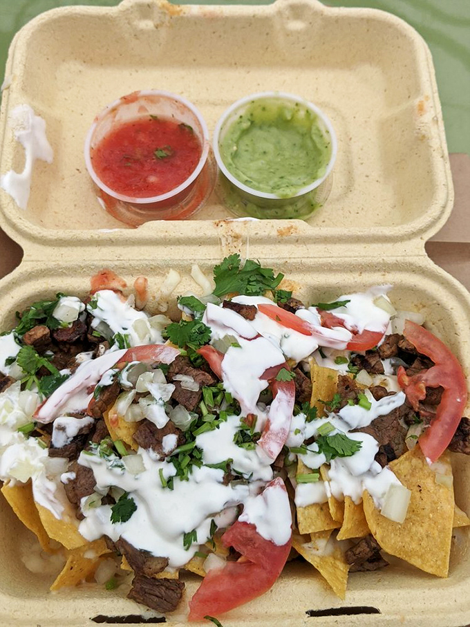 The to-go nachos come with their own salsa sidekicks, proving good things come in compostable packages when you're having a Mexican food emergency.