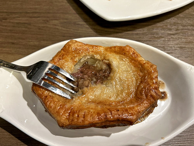 Cutting into this steak pie releases a savory steam that would make even the most stoic Brit shed a patriotic tear of joy.