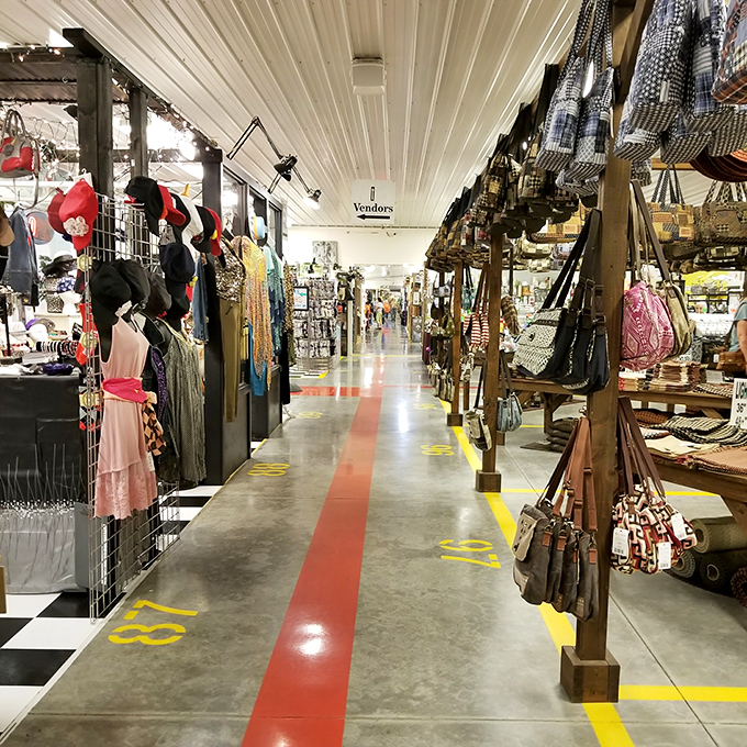 Fashion finds line this aisle where vintage meets handmade. That red stripe on the floor? It's the yellow brick road for style seekers.
