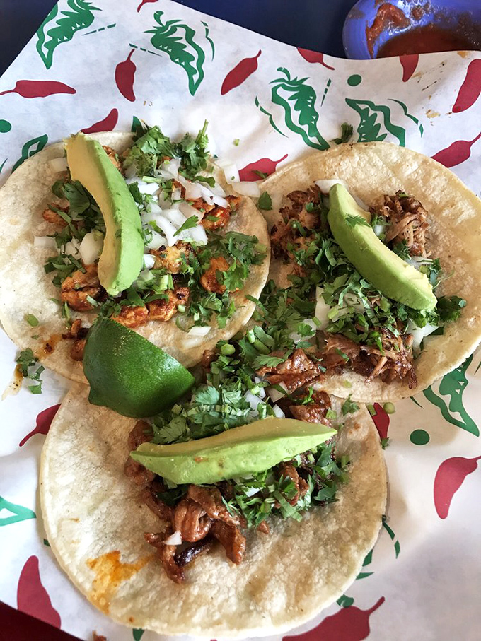 Street tacos that transport you straight to Mexico City without the passport hassle. Those avocado slices are practically waving hello!