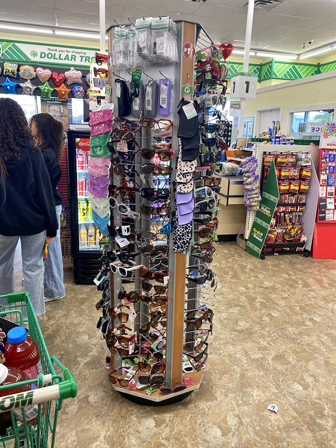 Sunglasses galore! Hollywood glamour meets Midwest practicality on this spinning display of affordable eye protection for sunny Michigan summer days.
