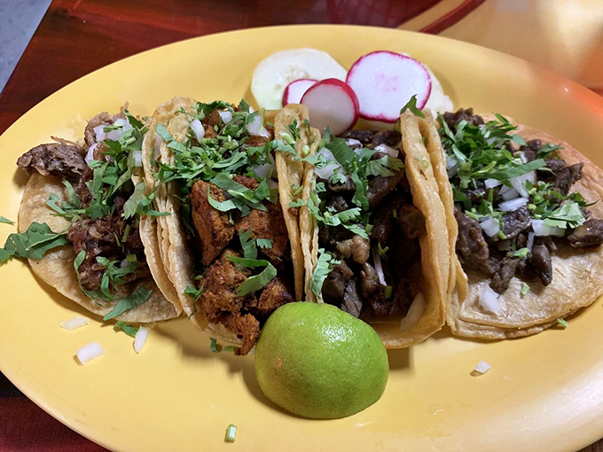 Street tacos done right—simple, authentic, and garnished with lime. The universal language of deliciousness needs no translation here.