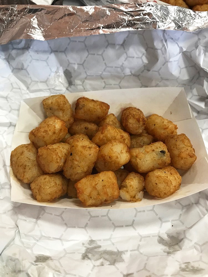 Golden-brown tater tots that crunch like autumn leaves, with a pillowy interior that makes you wonder why french fries get all the glory.