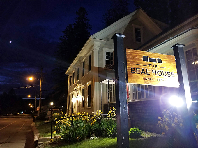 The Beal House glows with welcome as dusk settles over Littleton, promising comfort food that tastes like someone's grandmother (who went to culinary school) made it.
