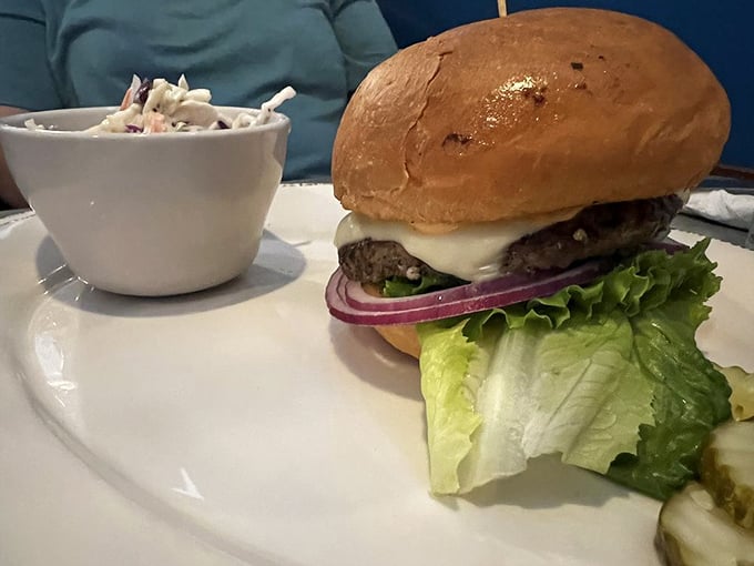 The Gobbler burger sits proudly on its throne of lettuce, a testament to what happens when turkey gets the royal treatment.