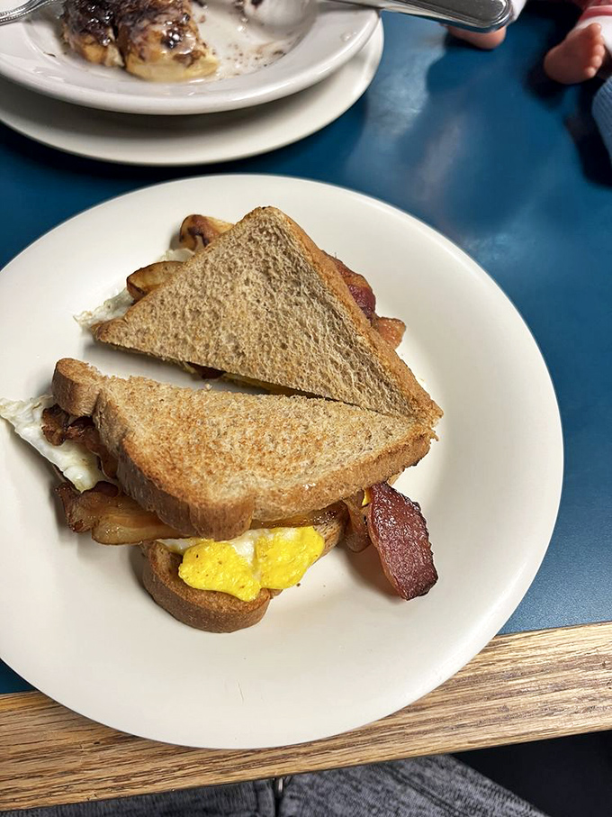 This breakfast sandwich isn't trying to impress food critics—it's busy satisfying hungry folks who appreciate simple pleasures done absolutely right.